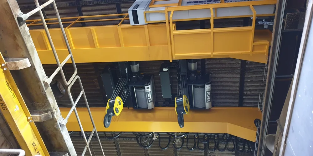 Wat is een bovenloopkraan? | Mennens Nederland | Mennens Nederland